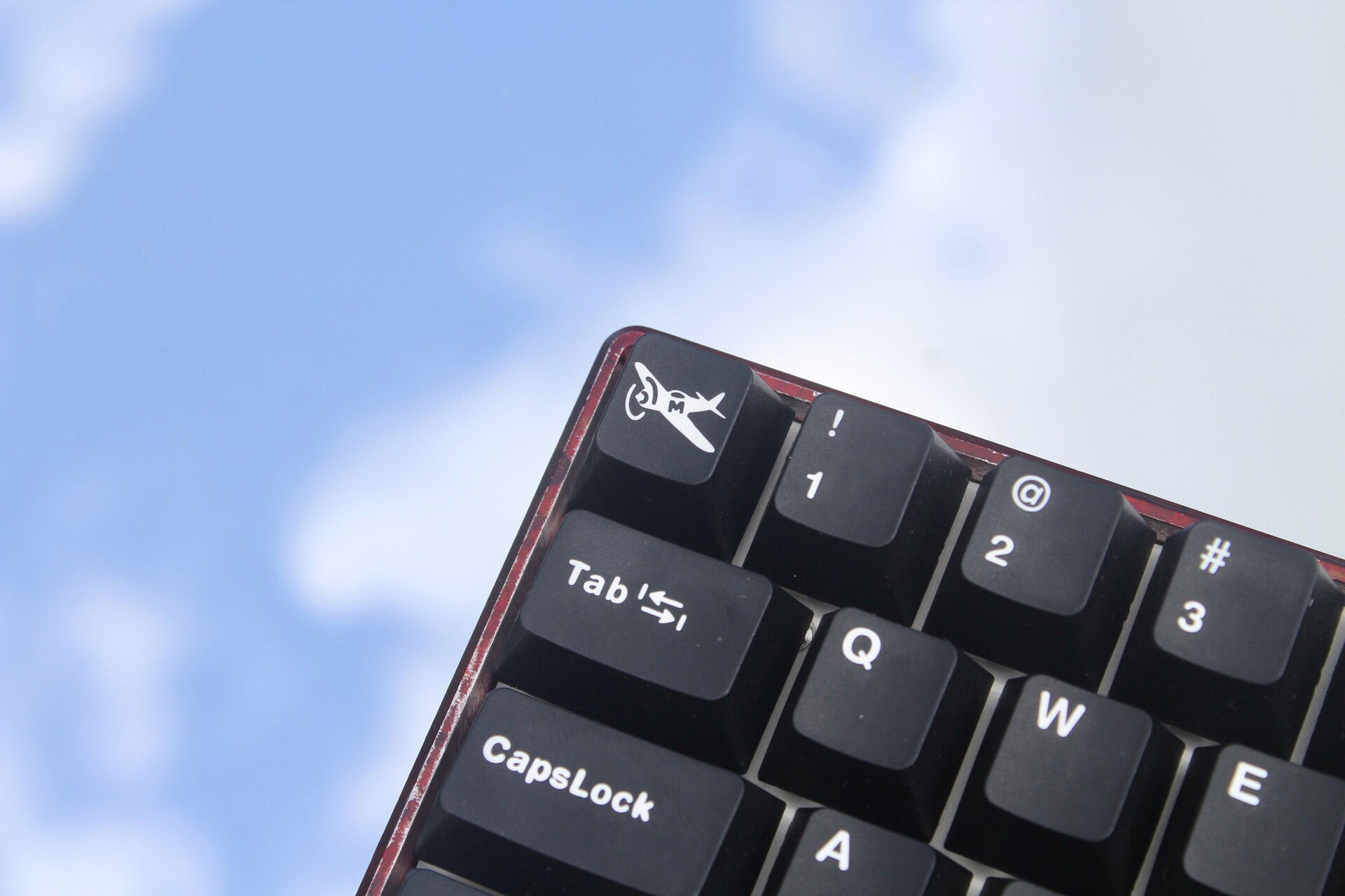 Custom Red and Black Splatter Patinaed 60% Keyboard » keebs.gg