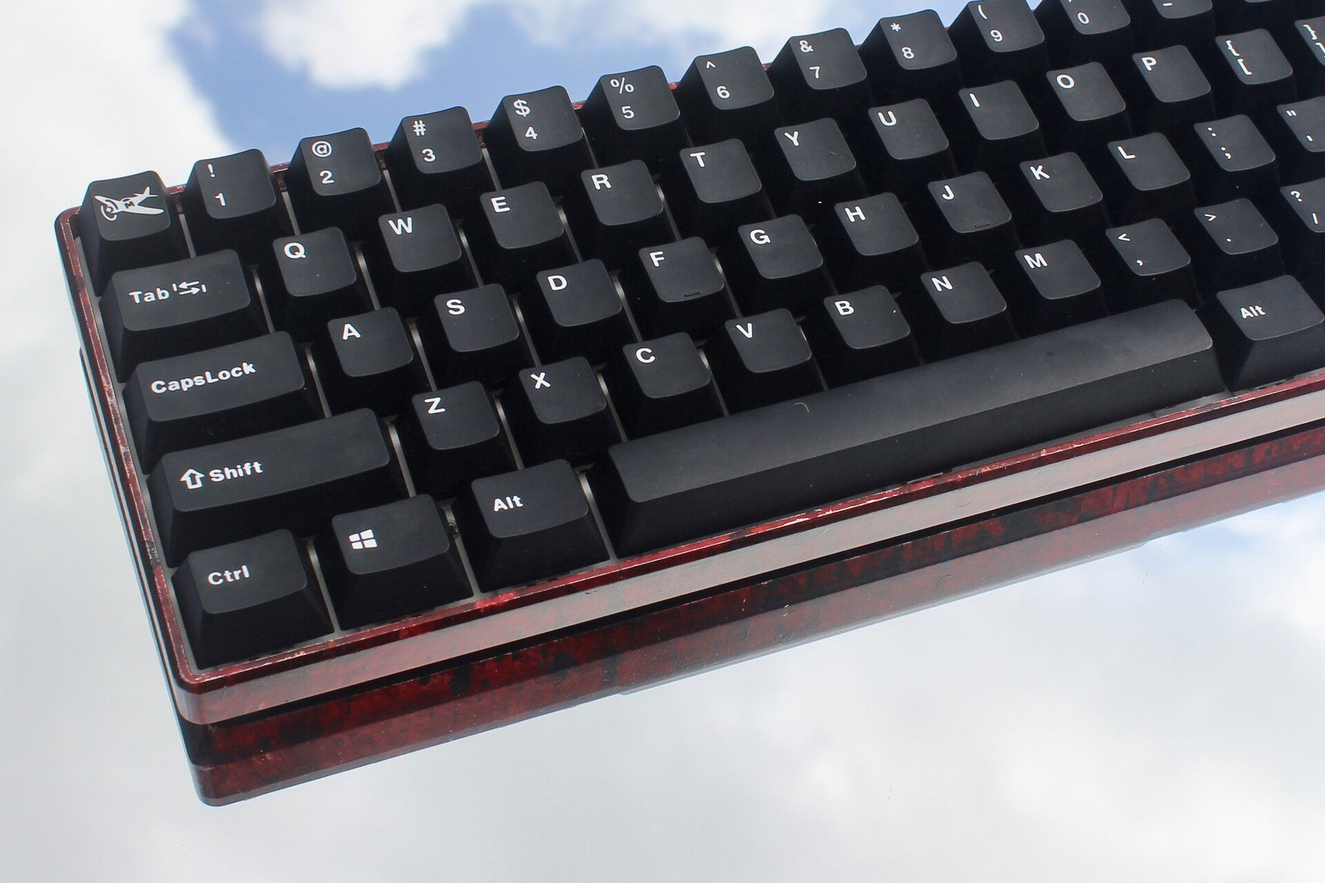 Custom Red and Black Splatter Patinaed 60% Keyboard » keebs.gg